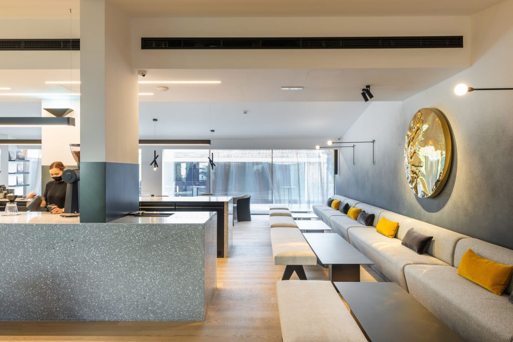 XO Atelier designs The Grey cafe in Dubai featuring a monochrome palette